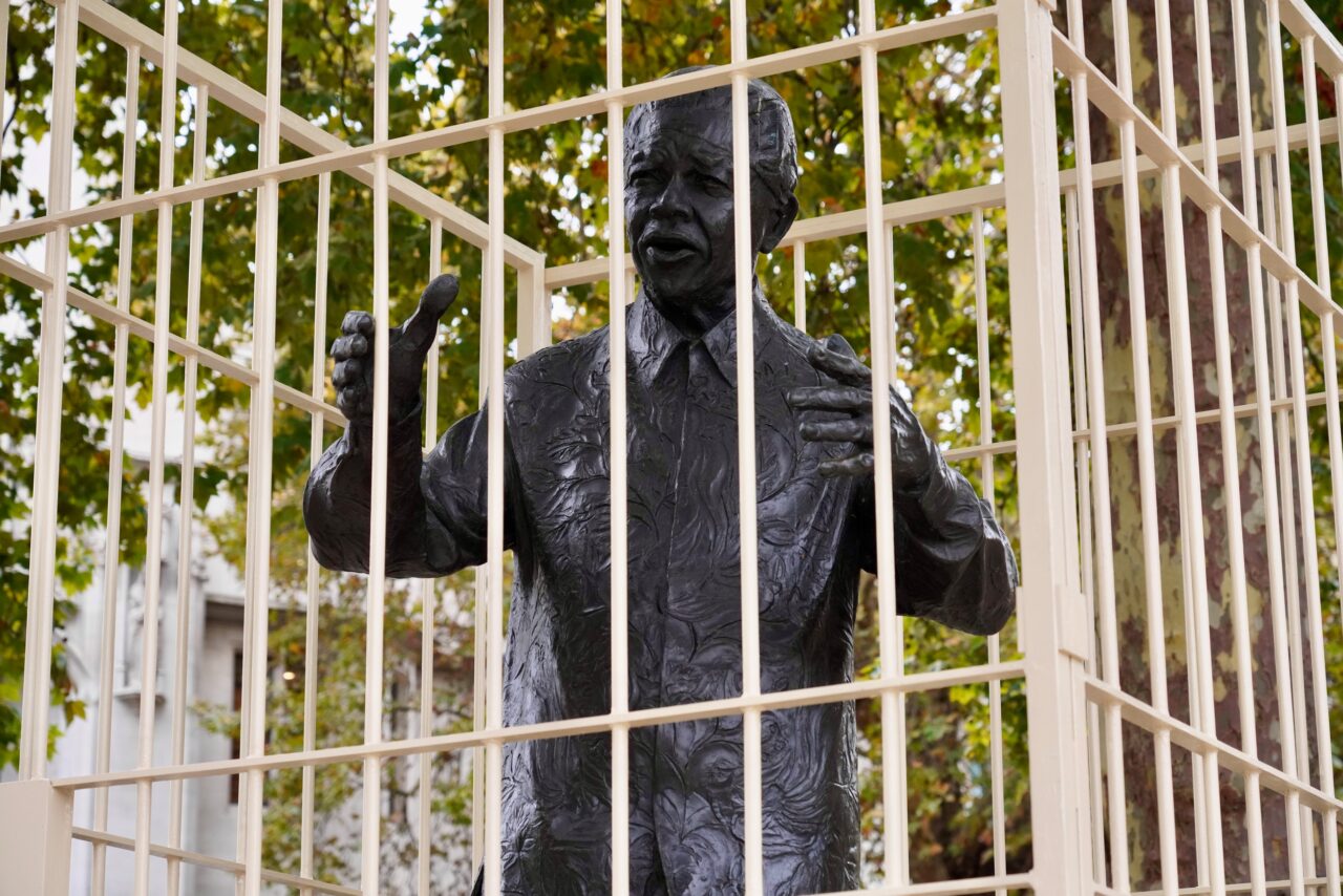 Why are there prison bars around the statues of Gandhi, Mandela and ...